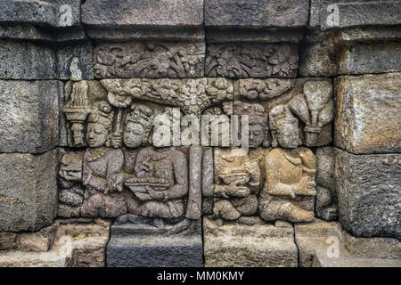 relief panels on the 4th balustrade of 9th century Borobudur Buddhist ...