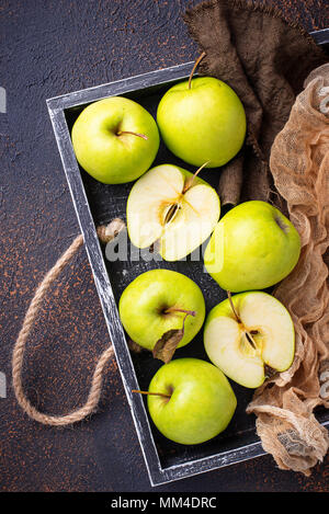 Fresh green apples on rusty background. Top view Stock Photo - Alamy