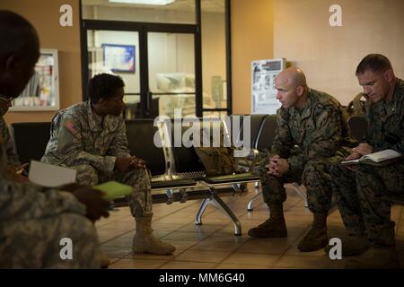U.S. Marine Corps Col. Farrell J. Sullivan, right, commanding officer ...