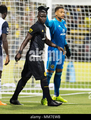Columbus Crew defender Jonathan Mensah kicks the ball during the first ...
