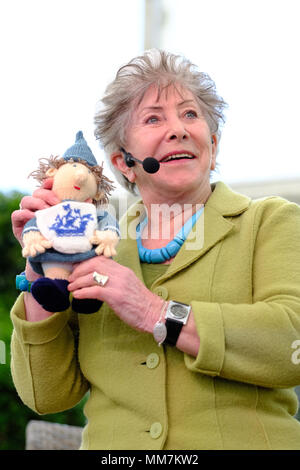 Blue Peter television presenter Val Singleton holds up some of the toy ...