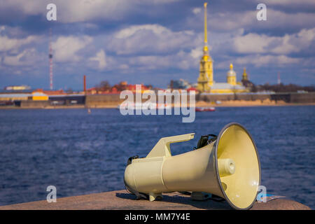 Close up of white megaphone at outsdoors with scenic river view of the ...