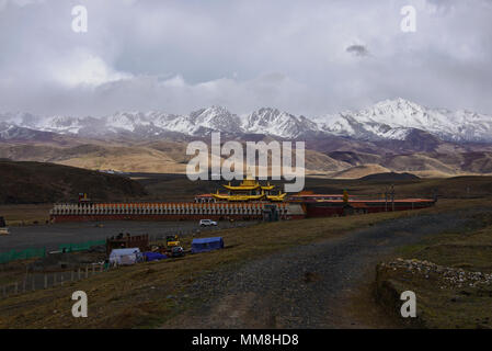 Muya Golden Tower and Yala Snow Mountain under a storm, Tagong, Sichuan ...