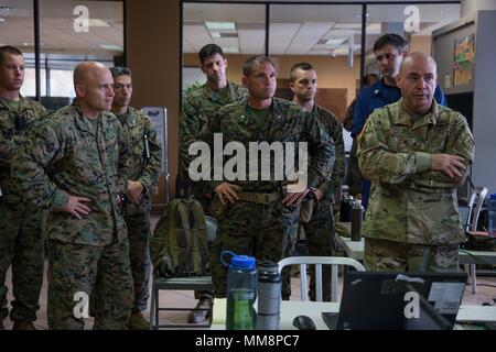 U.S. Marine Corps Col. Farrell J. Sullivan, right, commanding officer ...