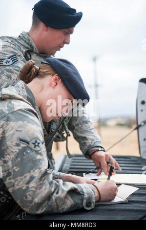 9th Security Forces Airmen, Staff Sgt. Ronald Kammeyer and Airman ...