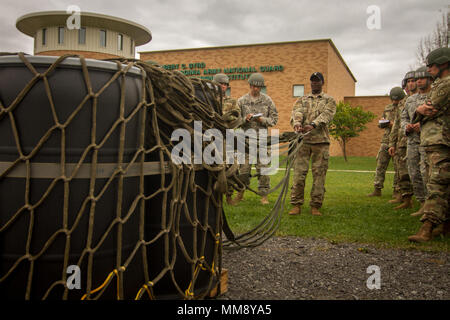 Air Assault Cadre, Sgt Jonathan Ellick, demonstrates a tying a knot for ...