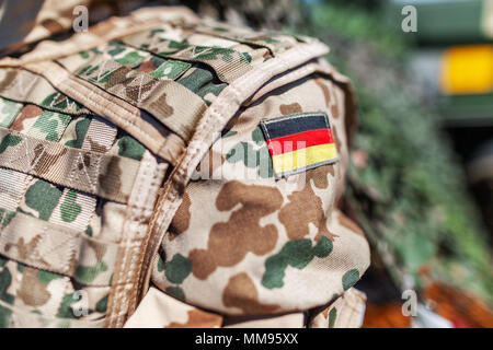 german flag on a german soldier desert uniform Stock Photo - Alamy