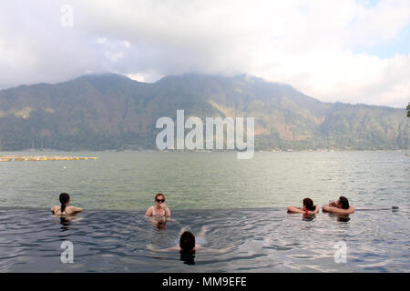 A hotspring in Bali (Toya Devasya), by the lake, facing a mountain ...