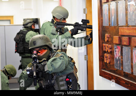 FORT SHAFTER, Hawaii- Members of the Special Reaction Team (SRT), 39th ...