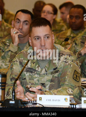 Col. Sean Davis, commander, 59th Ordnance Brigade, provides input ...