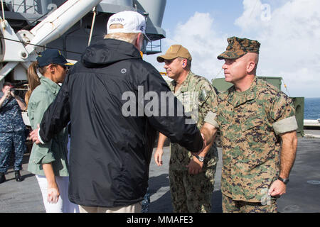 U.S. Marine Corps Col. Farrell J. Sullivan, right, commanding officer ...