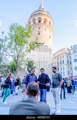 People walk in front of Karakoy port in Istanbul on 13 October 2019 ...