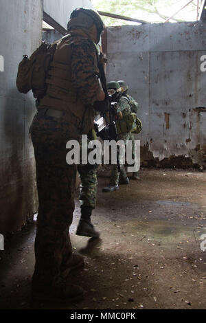 Philippine Marines conduct a room-clearing exercise at Fort Magsaysay ...