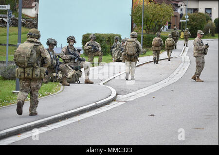 British soldiers conduct movement as a team during Royal Military ...