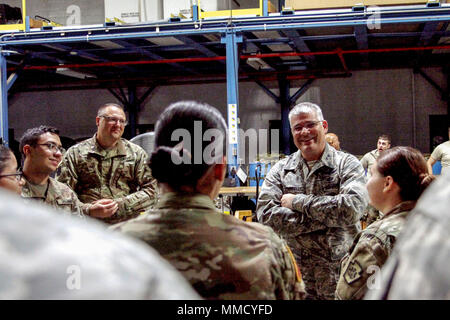 Maj. Gen. Tony Carrelli, Pennsylvania’s adjutant general, cuts the ...