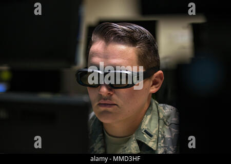 A targeteer with 613th Air Operations Center for Pacific Air Forces ...