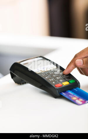 Close-Up One People Debit-Card Reader Bill Payment Pressing Button ...
