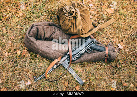 German Wehrmacht sub-machine gun of World War II MP 40 on ground. The ...