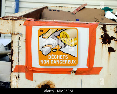 Sign recycling waste. The waste sorting and processing plant is blurry ...