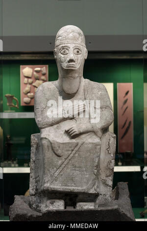 Stone statue of King Idrimi of Alalakh seated in his throne. 1570-1500 ...