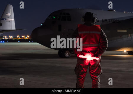 Soldiers from the 317th Support Maintenance Company connect hoses on ...