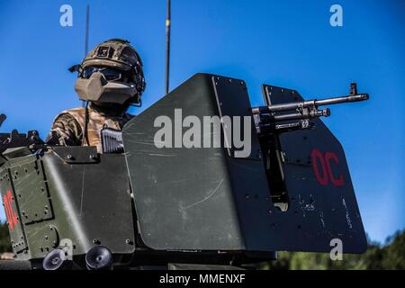 Royal Marine Commando Sgt. Chris Abrams supervises the conduct of the ...