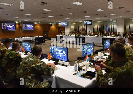 Army Lt. Gen. John Nicholson Jr., right, gets a kiss from his wife ...