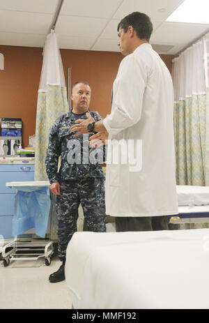Capt. Jeffrey Bitterman, center left, U.S. Pacific Fleet Surgeon and co ...