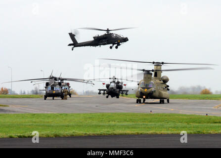An AH-64 Apache and a UH-60 Black Hawk fly during the South Carolina ...
