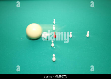 Italian billiards - bowling pins and balls Stock Photo - Alamy