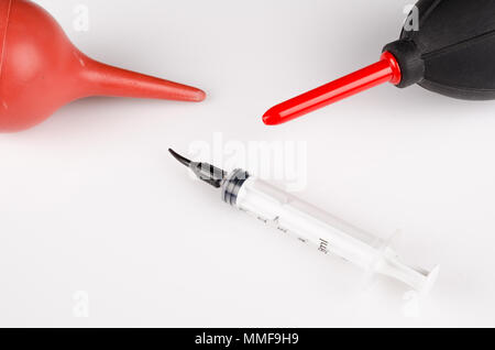 Syringe, bulb syringe and blower, a precision cleaning setup as used to ...