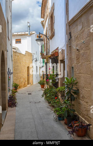 XABIA, SPAIN - APRIL 11TH 2018: One of the streets in the old town of ...