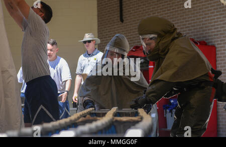 An In Place Patient Decon (IPPD) team member from the 8th Medical Group ...