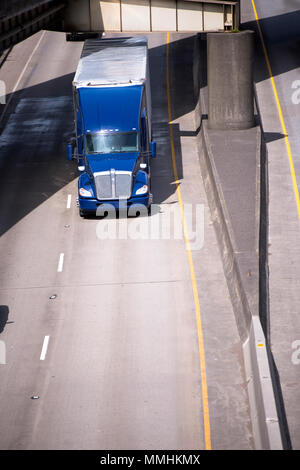 Trucks drive under the transport bridge. Transport logistics Stock ...
