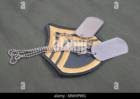 us army uniform period with blank dog tags and sergeant rank patch ...