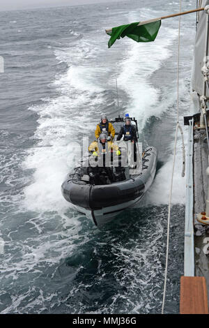 Royal Navy high speed ribs the Pacific 24 coming alongside HMS Somerset ...