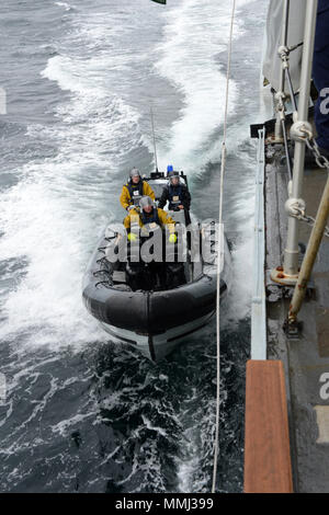 Royal Navy high speed ribs the Pacific 24 coming alongside HMS Somerset ...