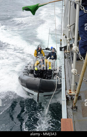 Royal Navy high speed ribs the Pacific 24 coming alongside HMS Somerset ...