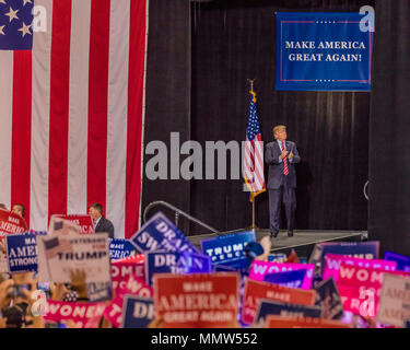 President Donald Trump gestures to a crowd of supporters from the Blue ...