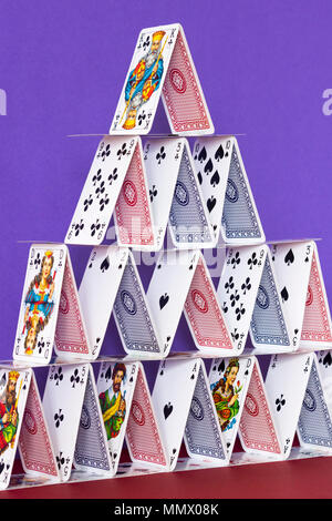 Playing cards stacked into a pyramid Stock Photo - Alamy