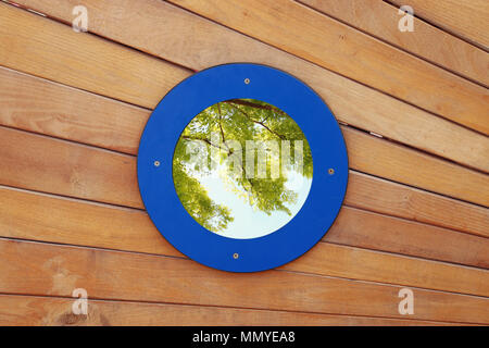 picture of old ship door with a round blue window Stock Photo - Alamy