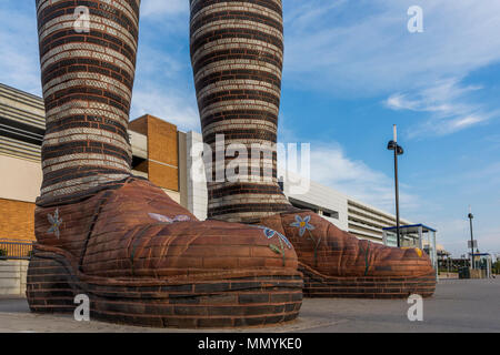 Giant ceramic leg and boot sculpture called "Immense Mode" at Southgate ...