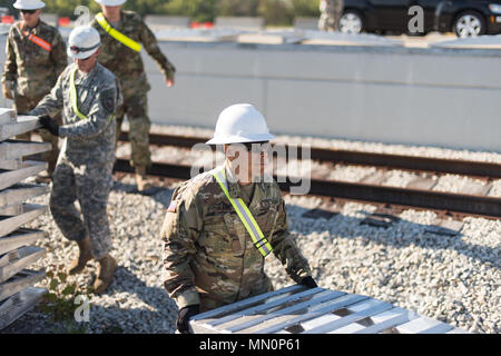 Soldiers with the 38th Sustainment Brigade set up rail car spanners at ...