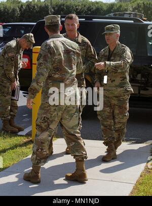 Lt. Gen. Paul M. Nakasone, commander of Army Cyber Command (right) and ...