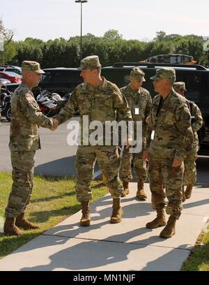 Lt. Gen. Paul M. Nakasone, commander of Army Cyber Command (right) and ...