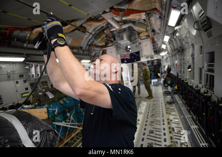 Royal Australian Air Force WOFF David Sheen, loadmaster with the 36th ...