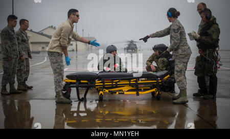 Personnel from 35th Fighter Weapons Squadron, prepare a bomb loader to ...