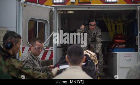 Personnel from 35th Fighter Weapons Squadron, prepare a bomb loader to ...