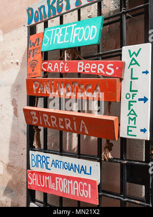 Rome, Trastevere, signs of a typical pub Stock Photo - Alamy