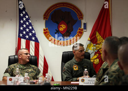 Lieutenant Gen. Robert F. Hedelund, left, the II Marine Expeditionary ...
